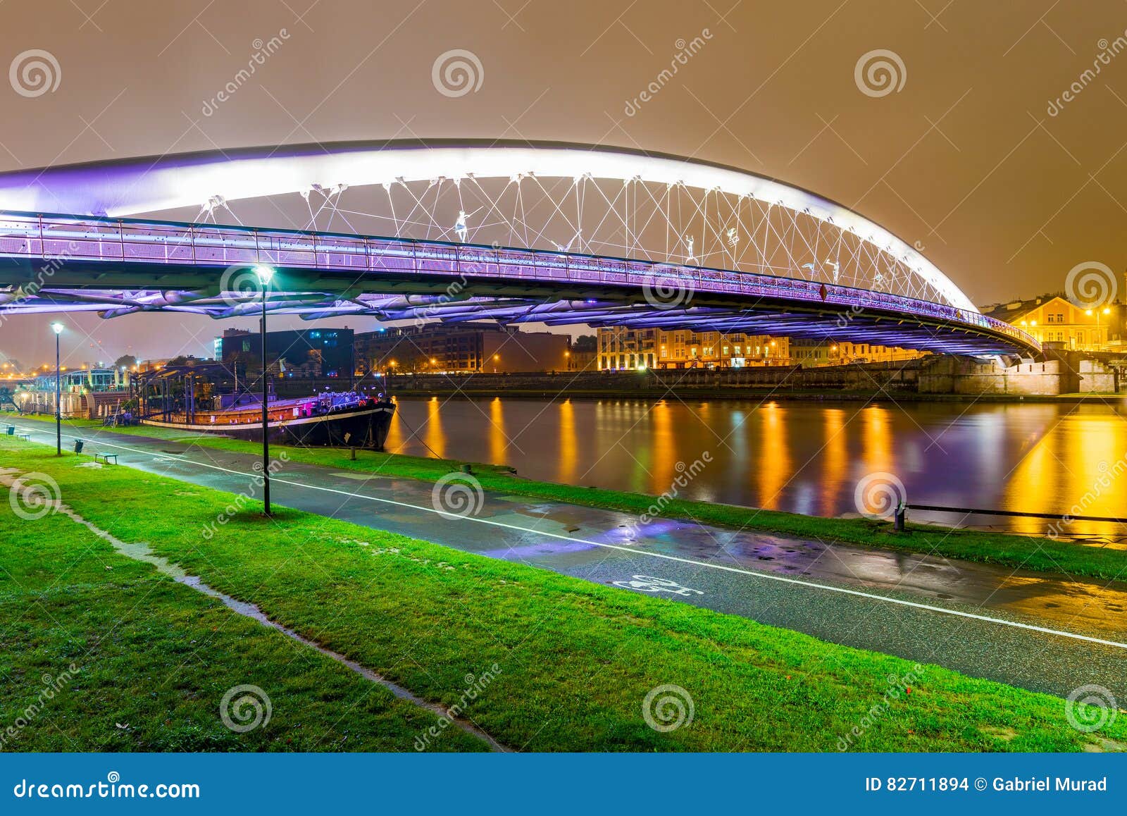 View of Lovers Bridge from Riverside Park at Night Stock Photo - Image ...