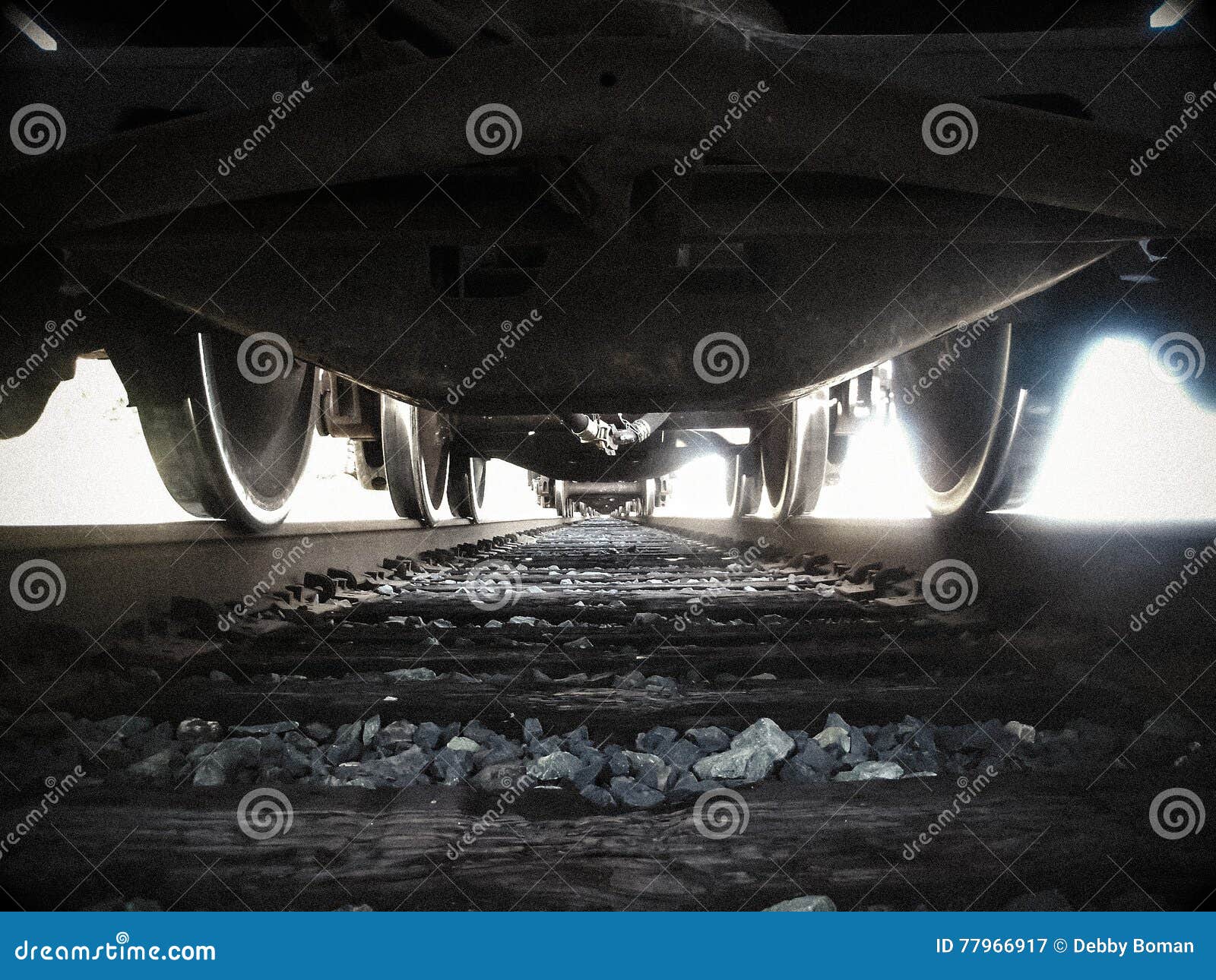 View Lying Underneath a Train Stock Image - Image of railroad, railcar ...