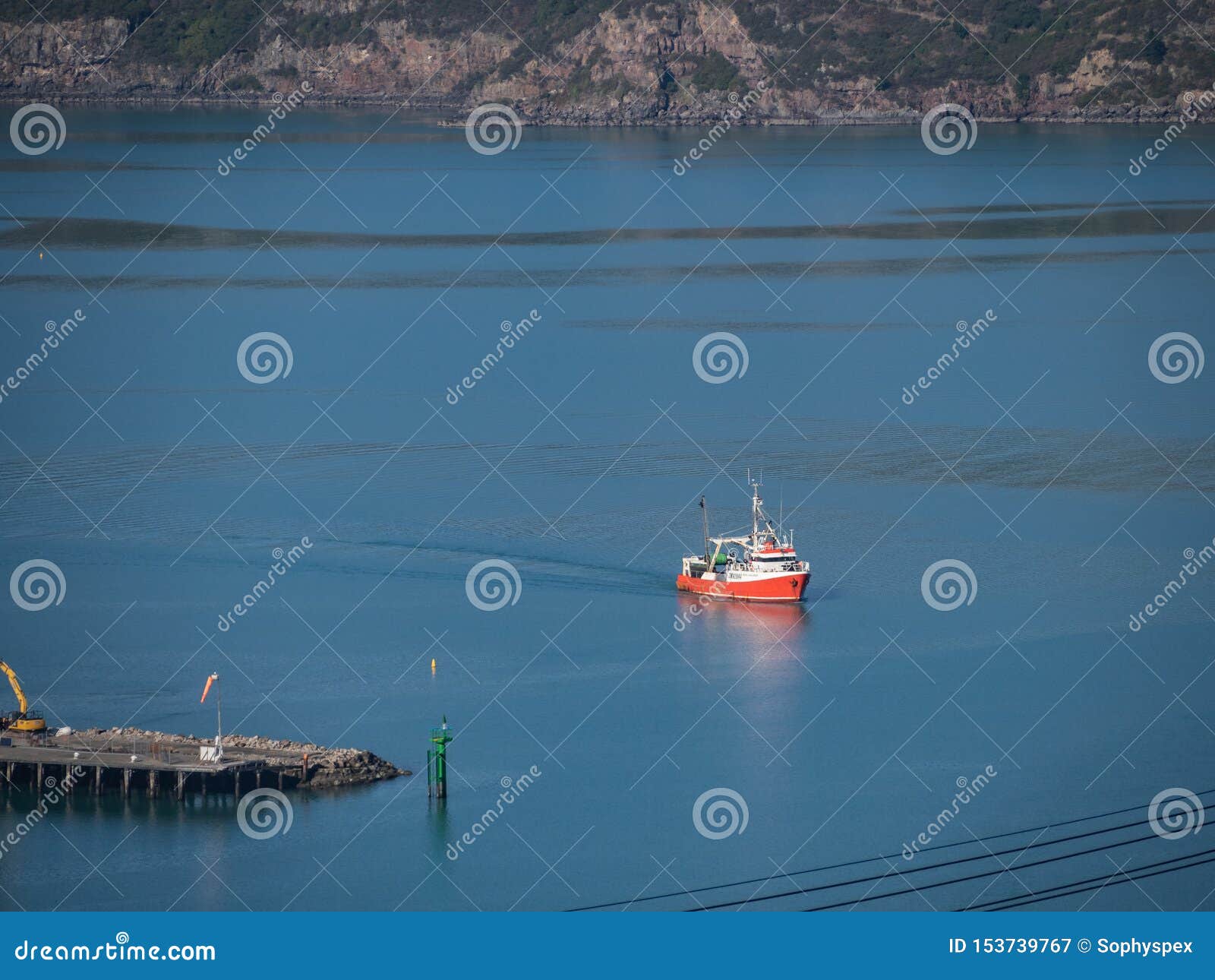 View of Lyttleton Harbour with Jetty and Red Boat Stock Image - Image ...