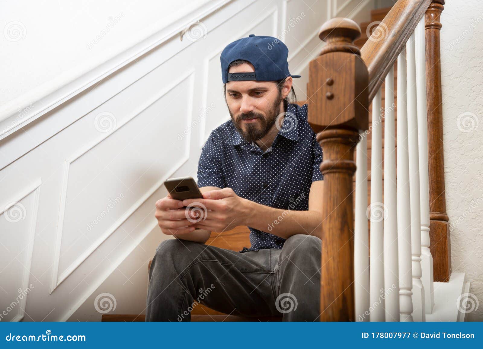 Man cellphone staircase stock image. Image of merchandise - 178007977