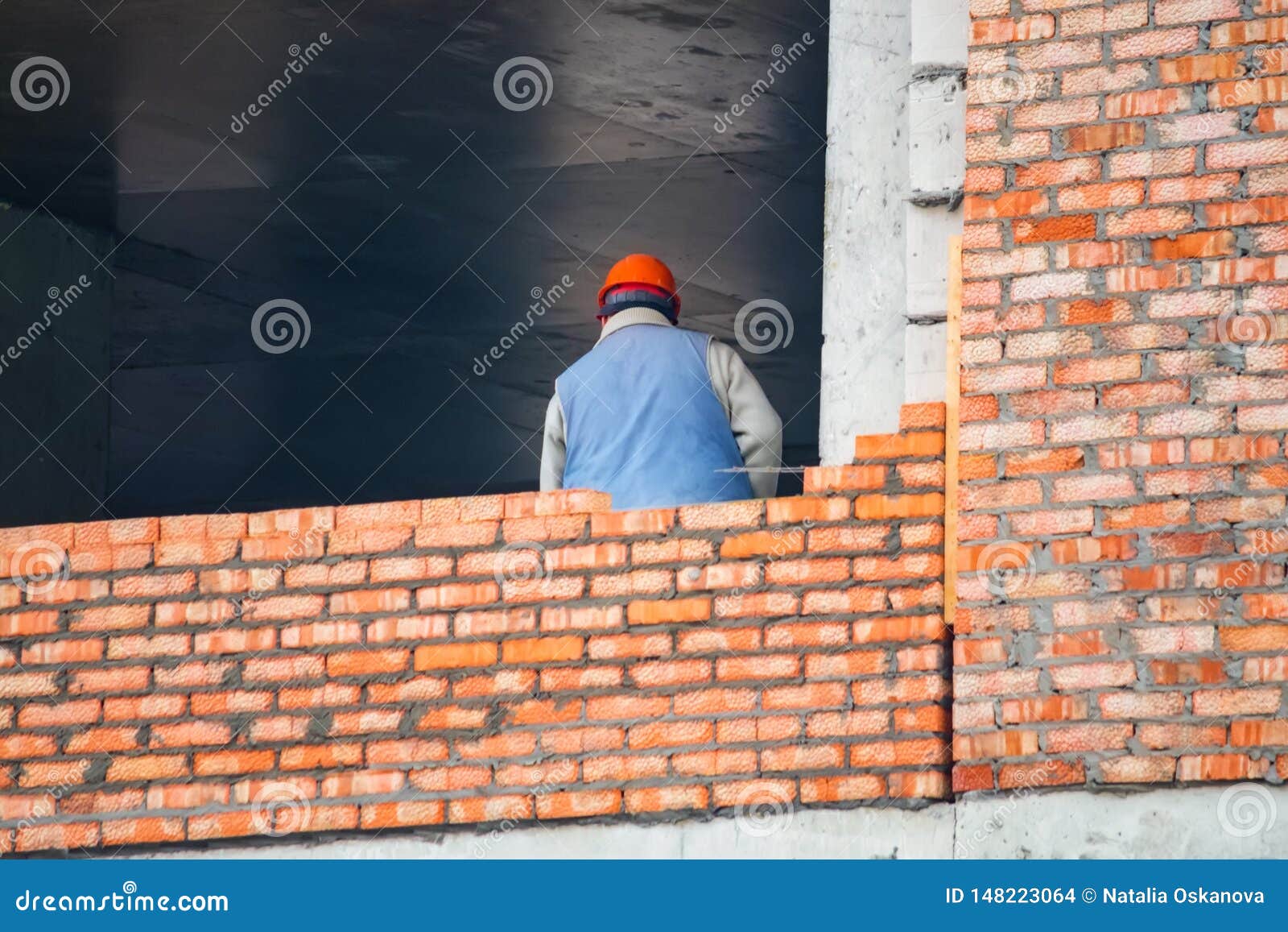 View of Mason Laying Bricks at Construction Site Stock Photo - Image of ...