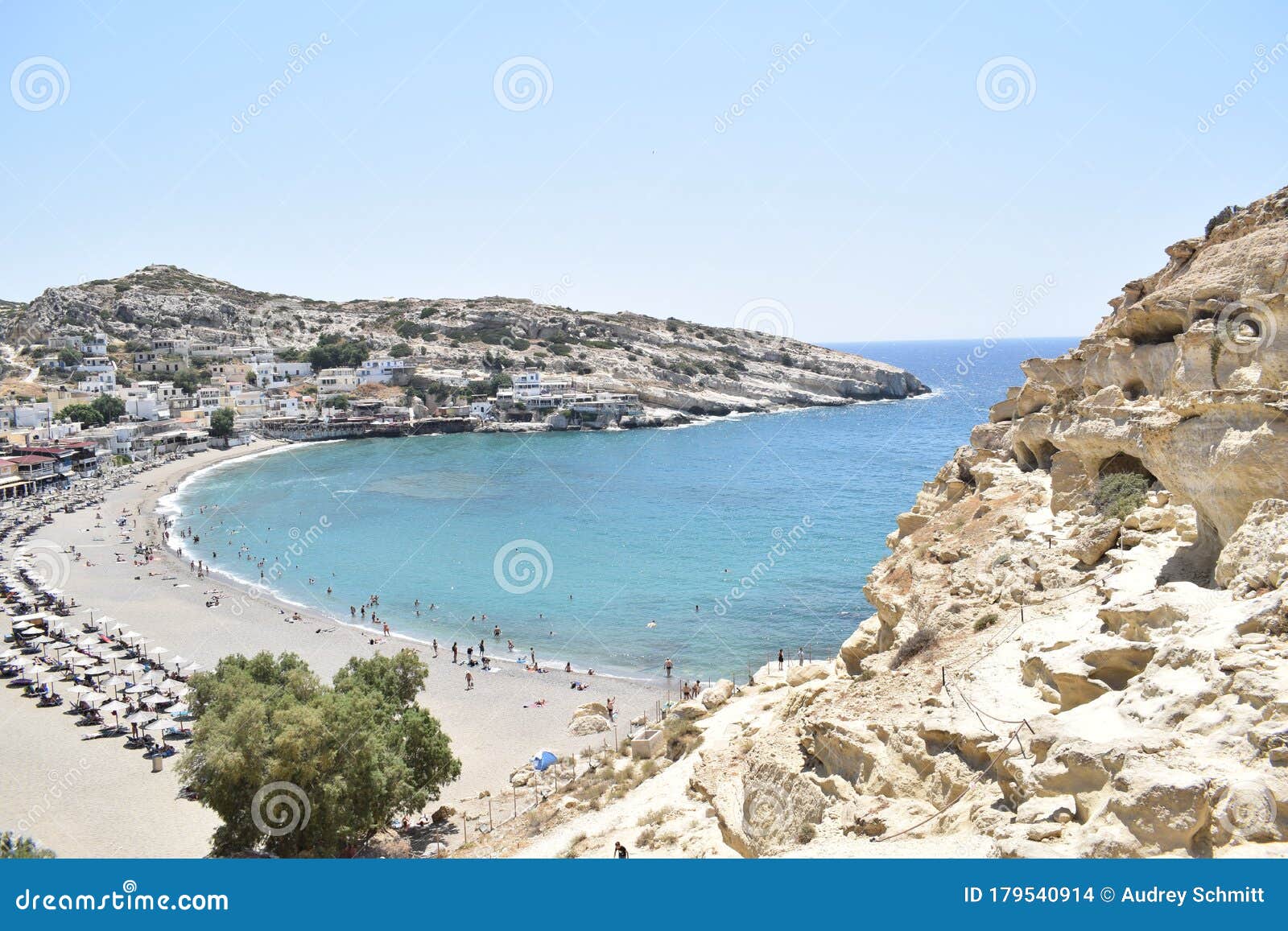View of Matala Beach from the Caves Stock Photo - Image of organ ...