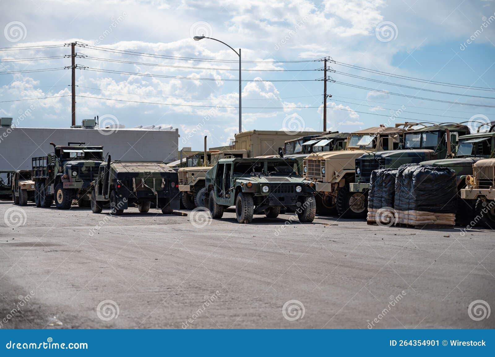 View of Mechanical Workshop of a Military Base, Various Light Vehicles ...