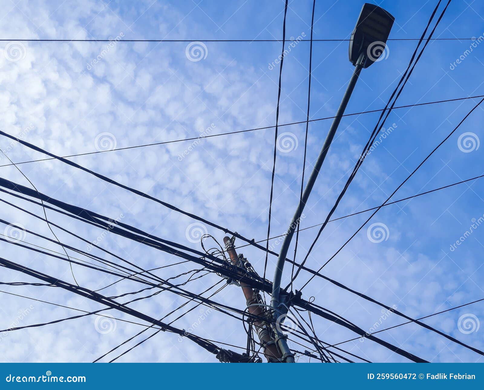 View of Messy Cable Lines on a Pole Stock Photo - Image of messy, tower ...
