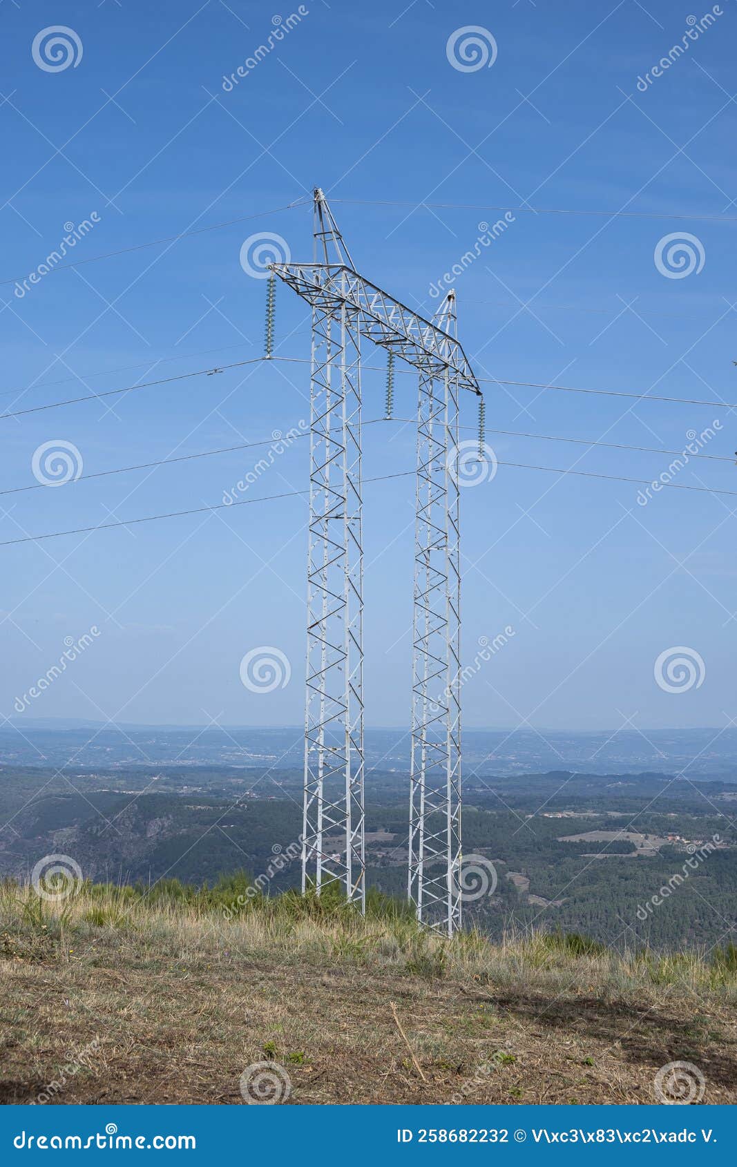 View of a Metallic High Voltage Pylon on a Blue Sky Day Stock Photo ...