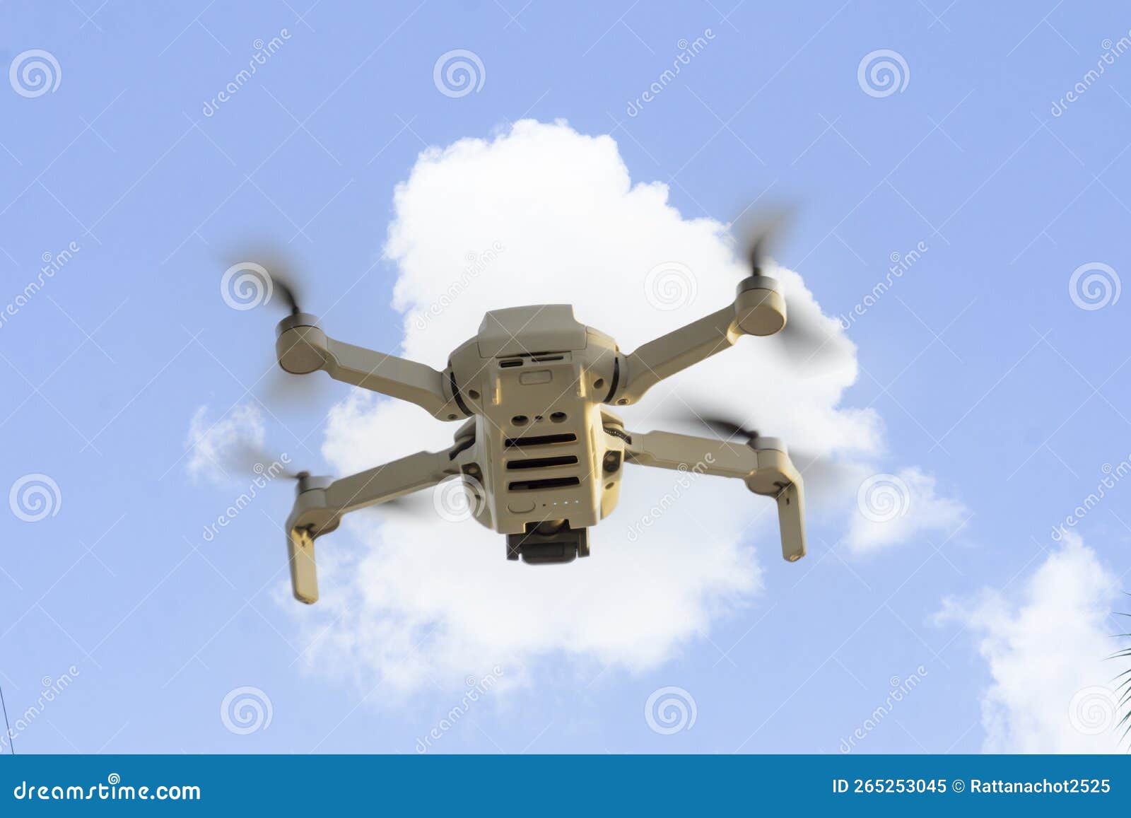View on Mini Copter Drone Flying in the Blue Sky. Remote Controlled ...