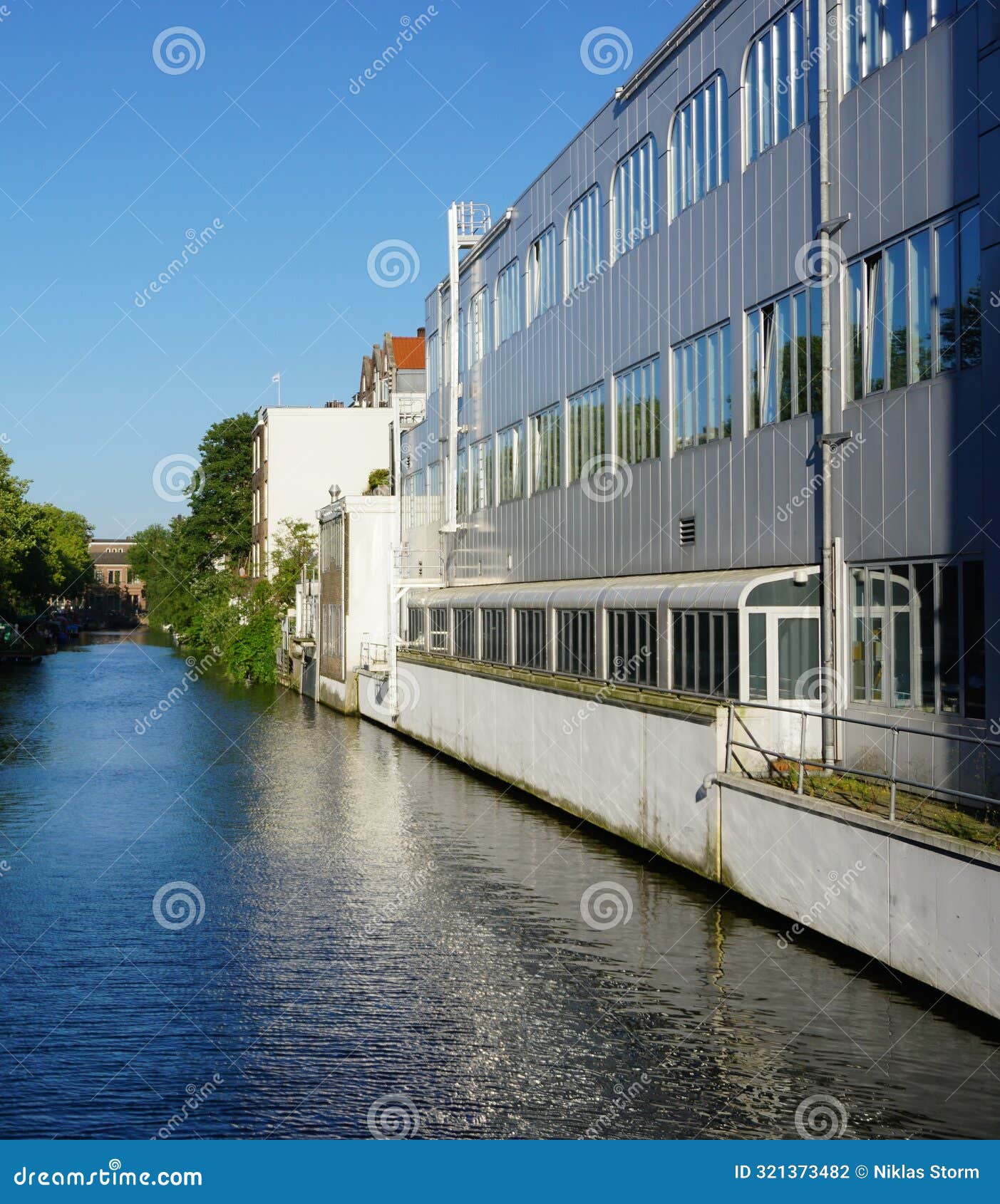 View of a Modern Building by the Canal Stock Photo - Image of nature ...