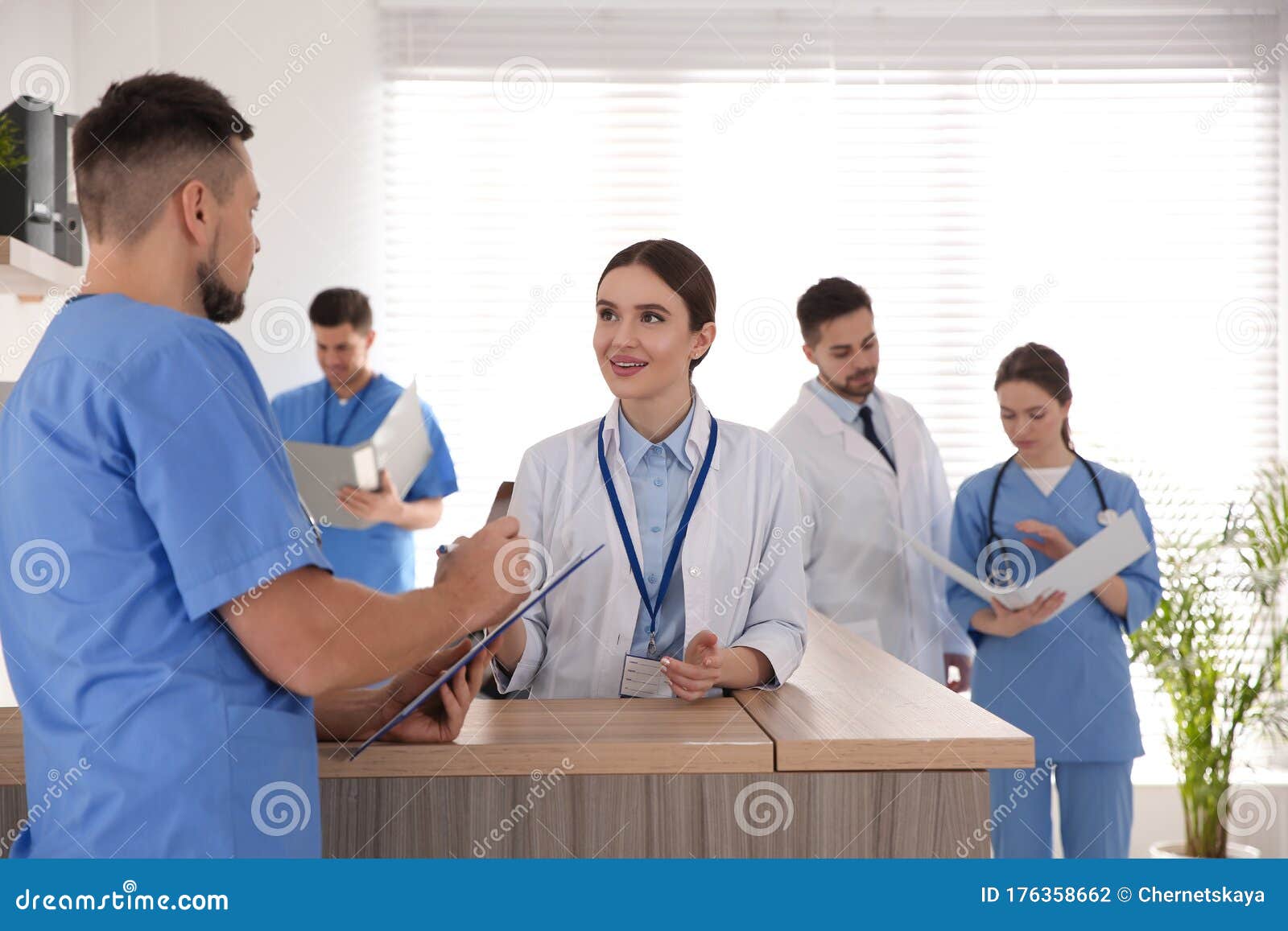 View of Clinic with Working Doctors Stock Photo - Image of background ...