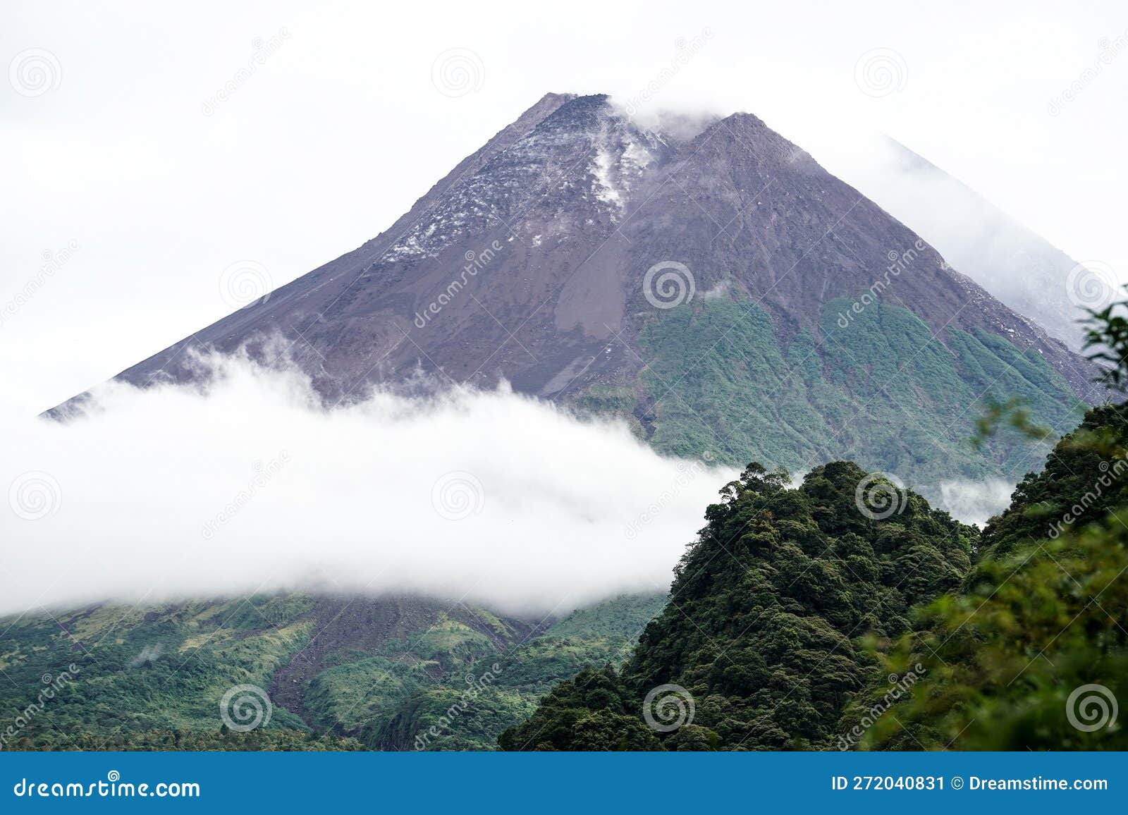 View of Mount Merapi in the Morning, and Slightly Covered by Clouds ...
