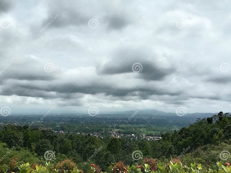 View of a Mountain Covered in Mist and Clear Clouds Stock Image - Image ...