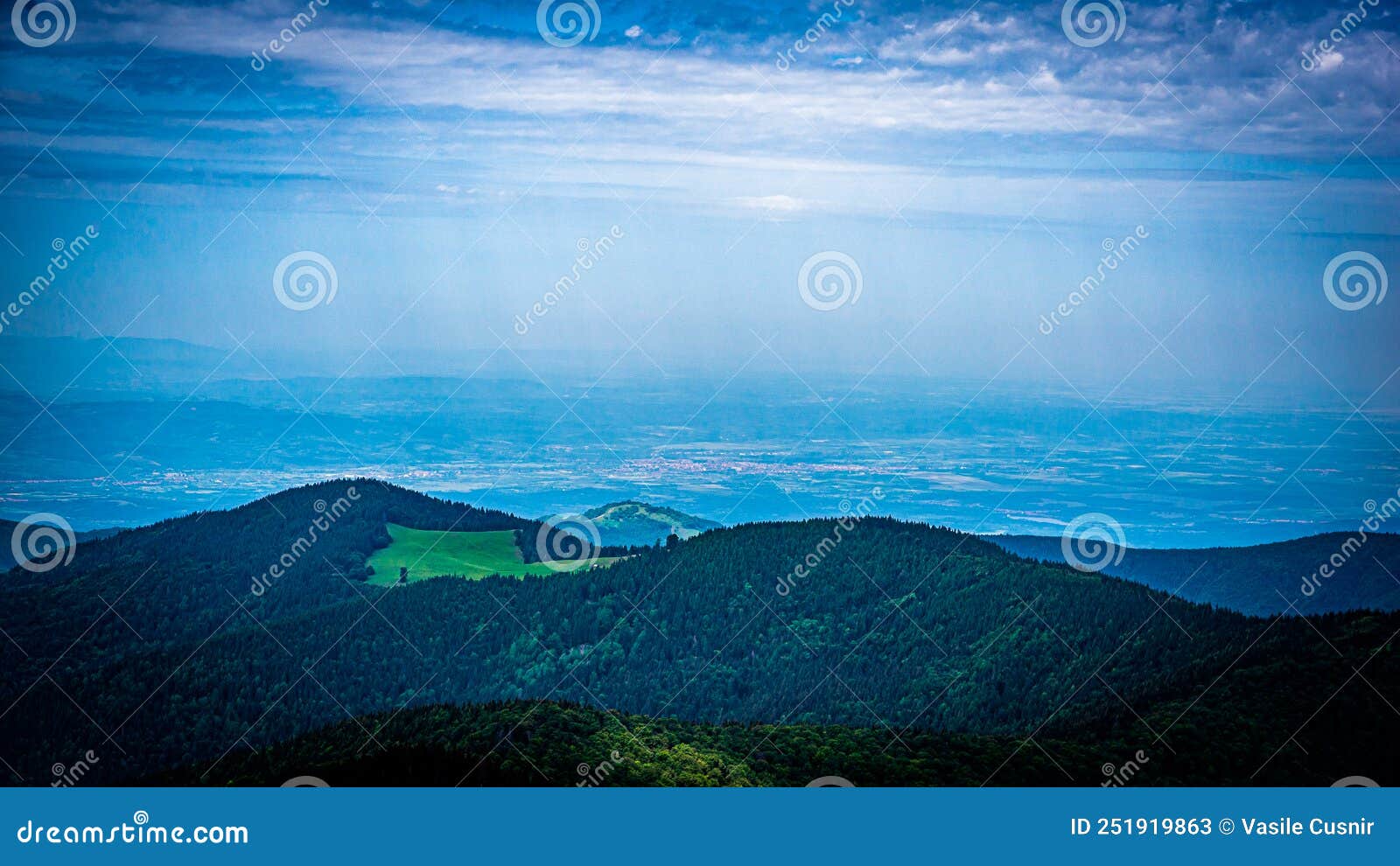 View from the Mountain Top Over the Valley with a Town in the ...