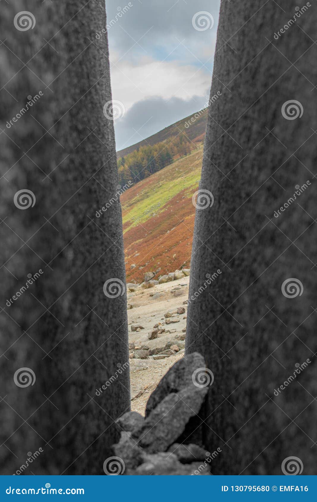 View of Mountains through a Split Boulder Stock Photo - Image of scenic ...