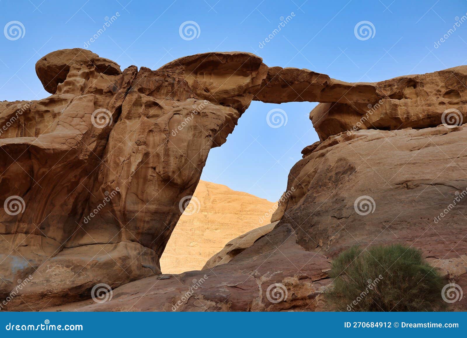 View of Natural Stone Bridge in Wadi Rum Desert Stock Photo - Image of ...