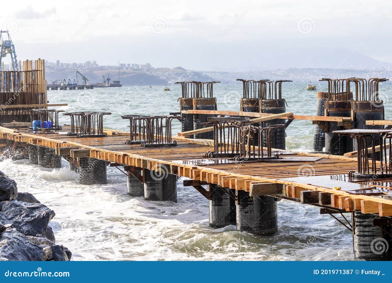 View of the New Pier Piles of the Harbor. a Pile or Piling is a ...