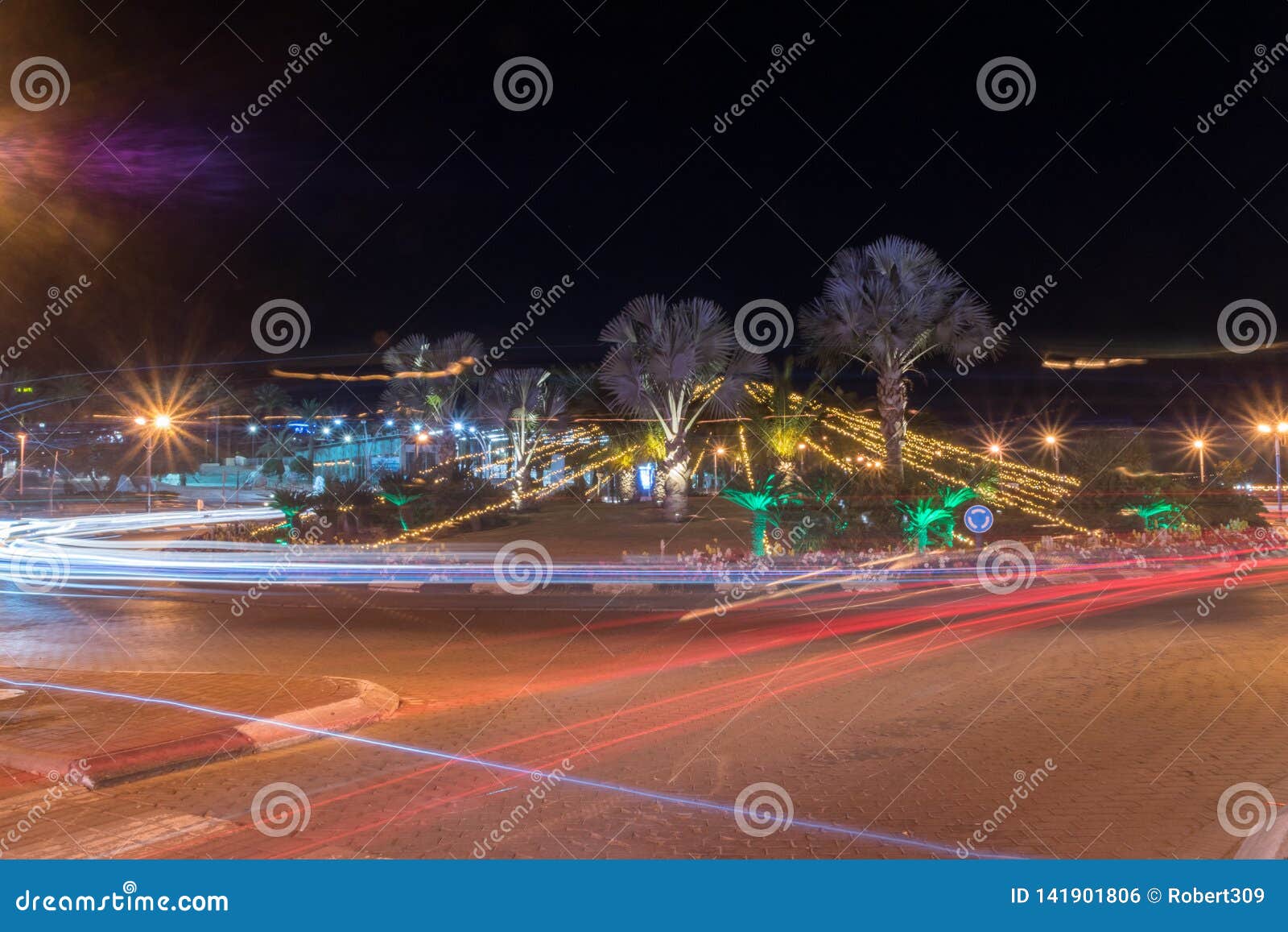 View on Night City Traffic at Roundabout with Long Exposure Stock Photo ...