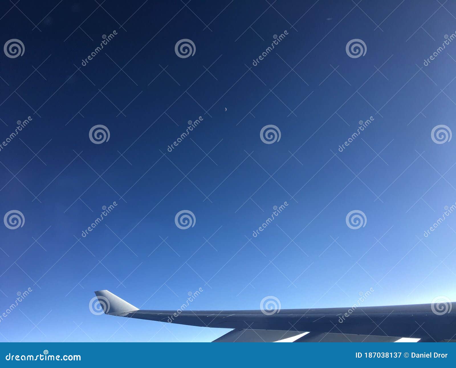 View out of a plane window stock image. Image of wing - 187038137