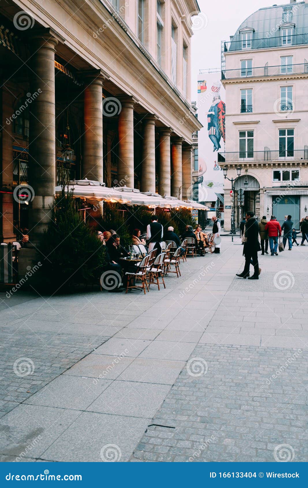 View of an Outdoor Cafe Surrounded by Nice Modern Buildings during ...