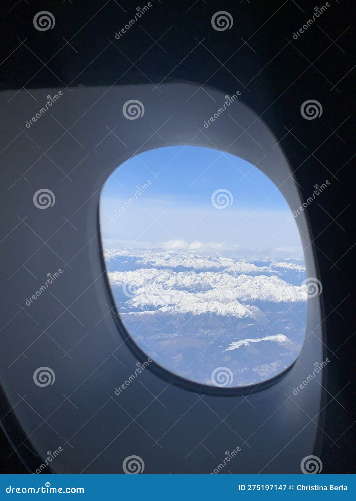 View Over the Alps from an Airplane Window Mid-flight Stock Image ...