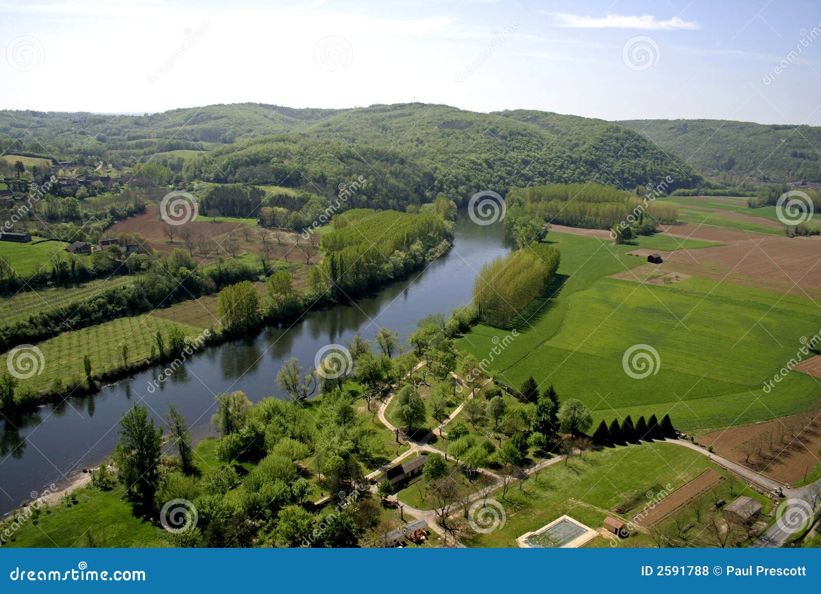 View over fields and river stock photo. Image of garden - 2591788