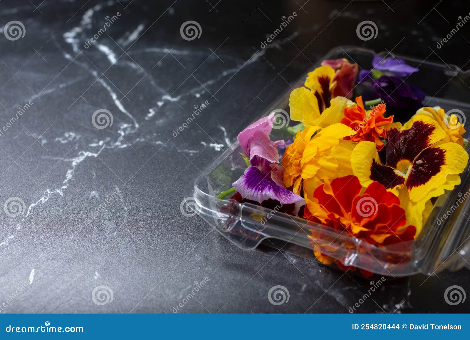 Edible flowers package stock photo. Image of farmer - 254820444