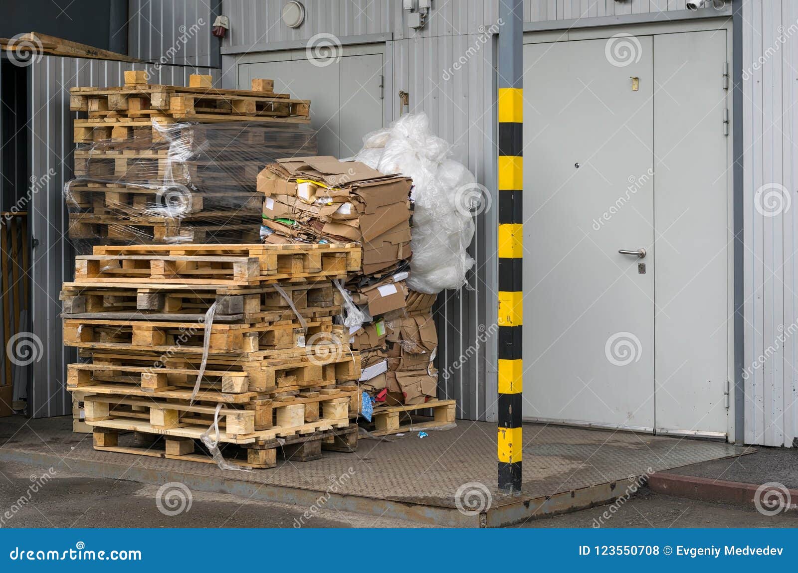View on Pallets, Boxes in Front of the Door of the Warehouse or Store ...