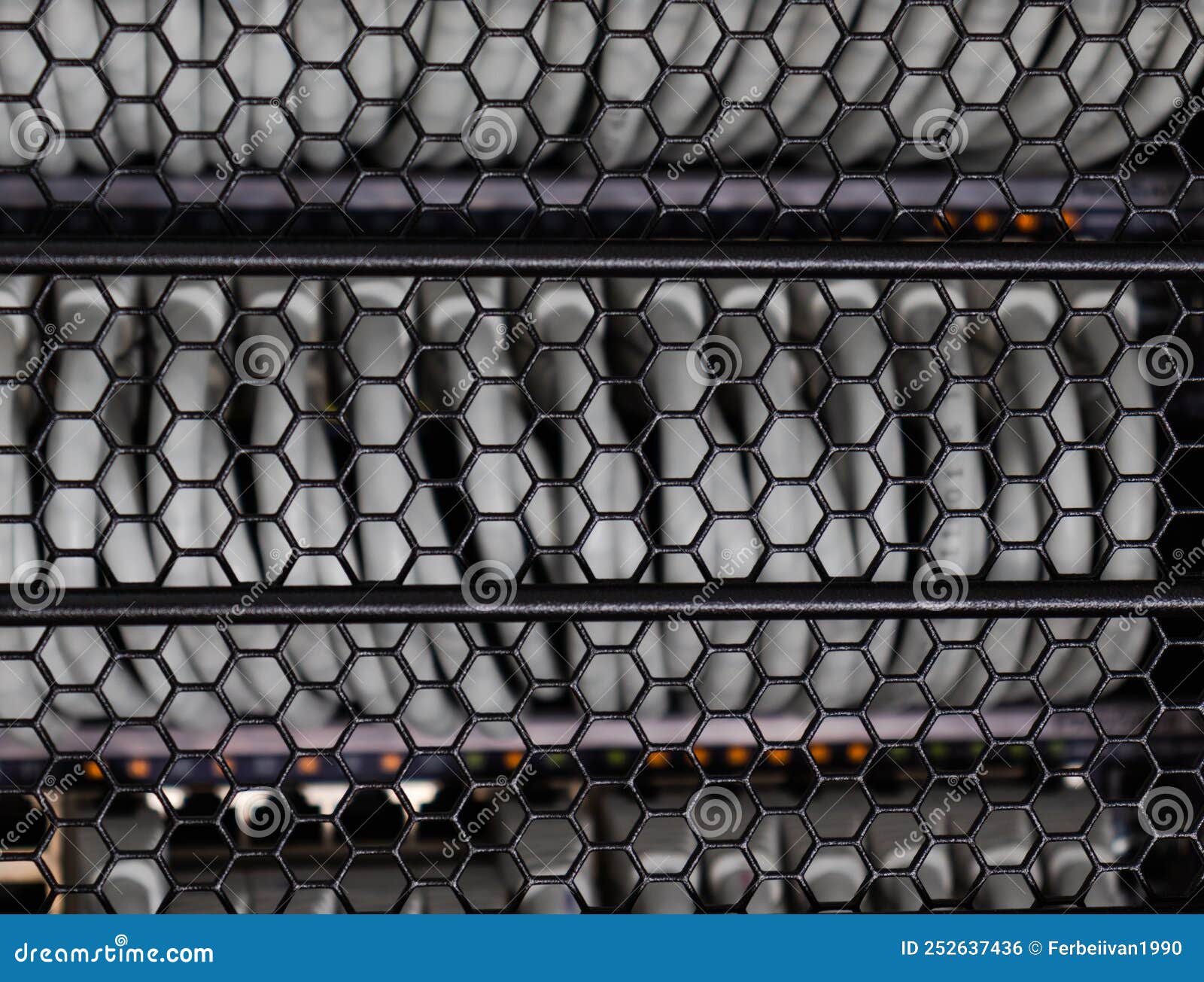 View of Perforated Server Rack Door and Network Cables Connected into ...