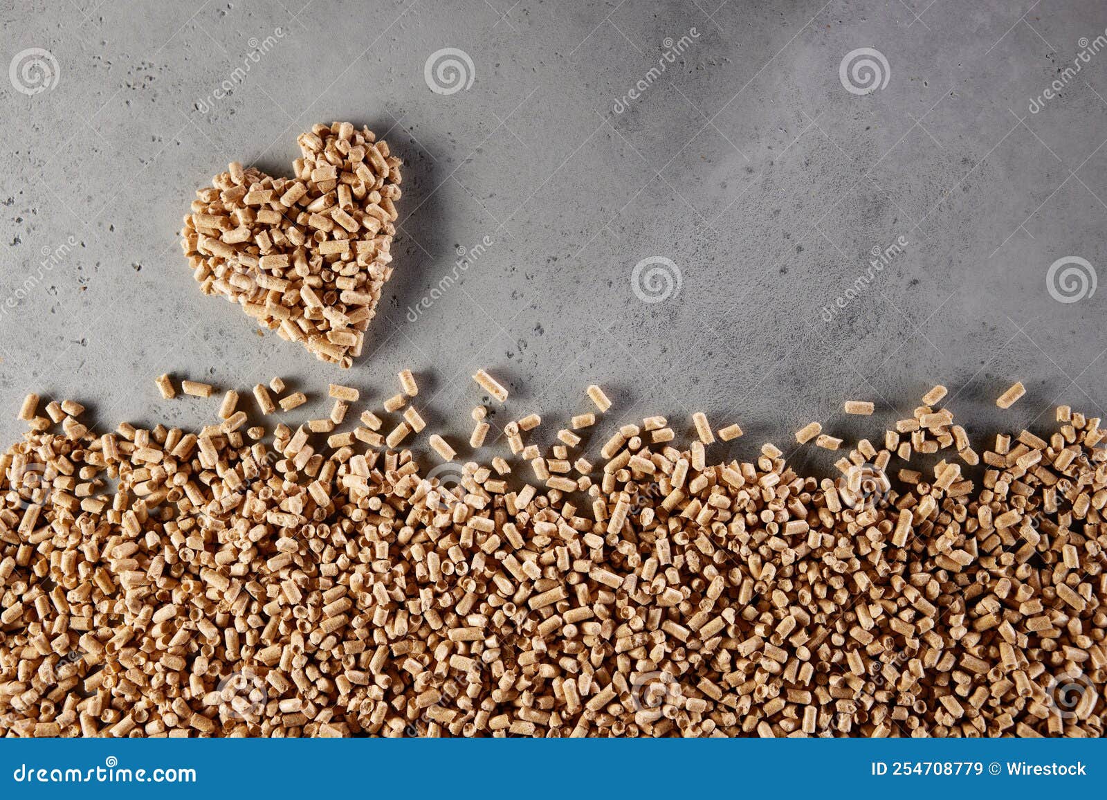 View of Pile of Solid Fuel Pellets Scattered on Gray Background and ...