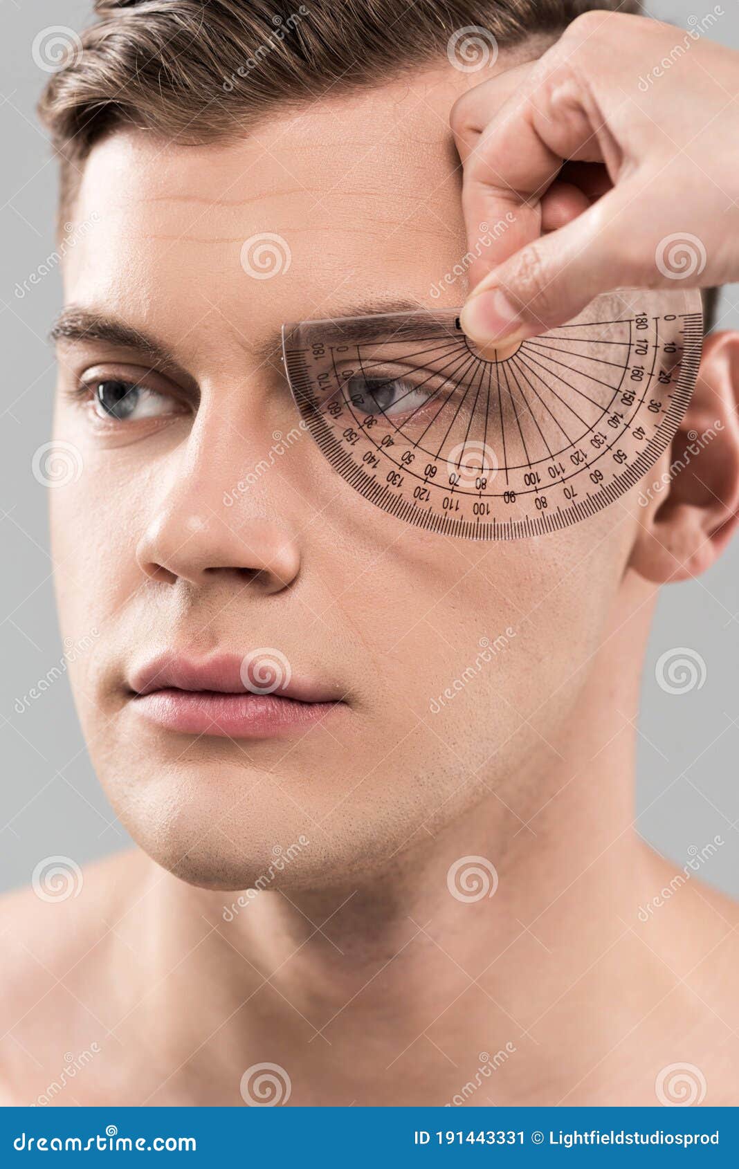 View of Plastic Surgeon Measuring Face with Protractor Isolated on Grey ...