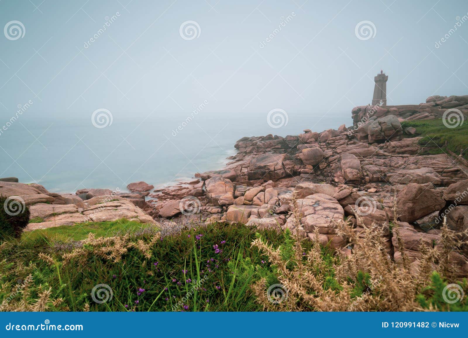 View of the Ploumanach Lighthouse by a Foggy Evening. Stock Photo ... View of the Ploumanach Lighthouse by a Foggy Evening. Stock Photo ...