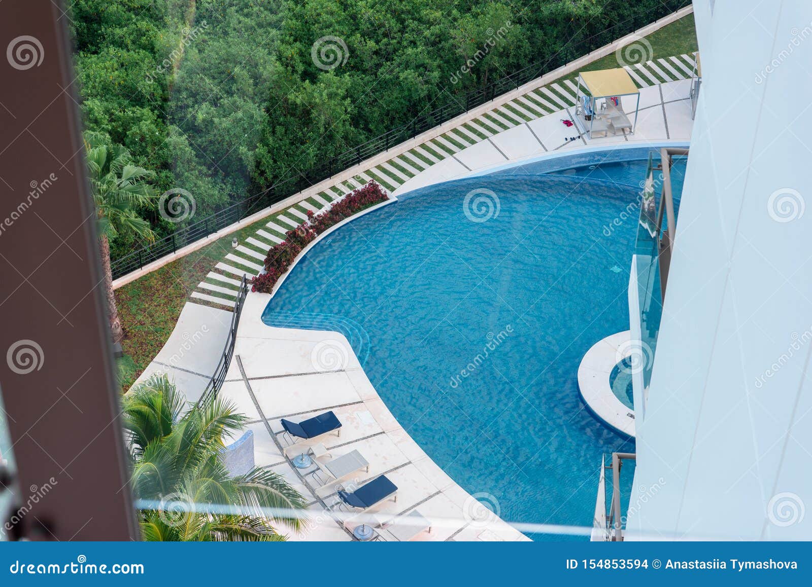 View of the Pool from the Window of the Upper Floor of a High-rise ...