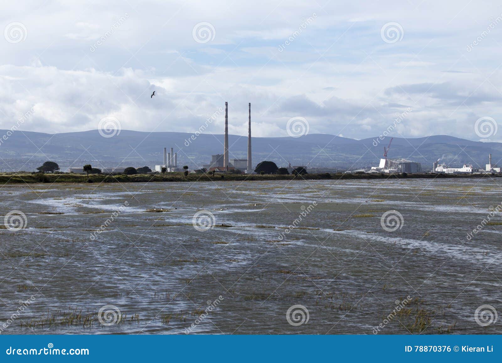 View of Poolbeg Towers from Clontarf Stock Photo - Image of locations ...