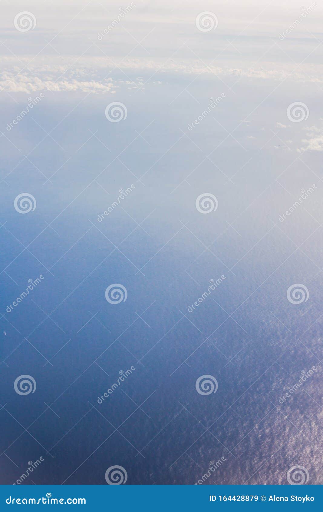 View from the Porthole of an Plane. Clouds Over Atlantic Ocean. Stock ...