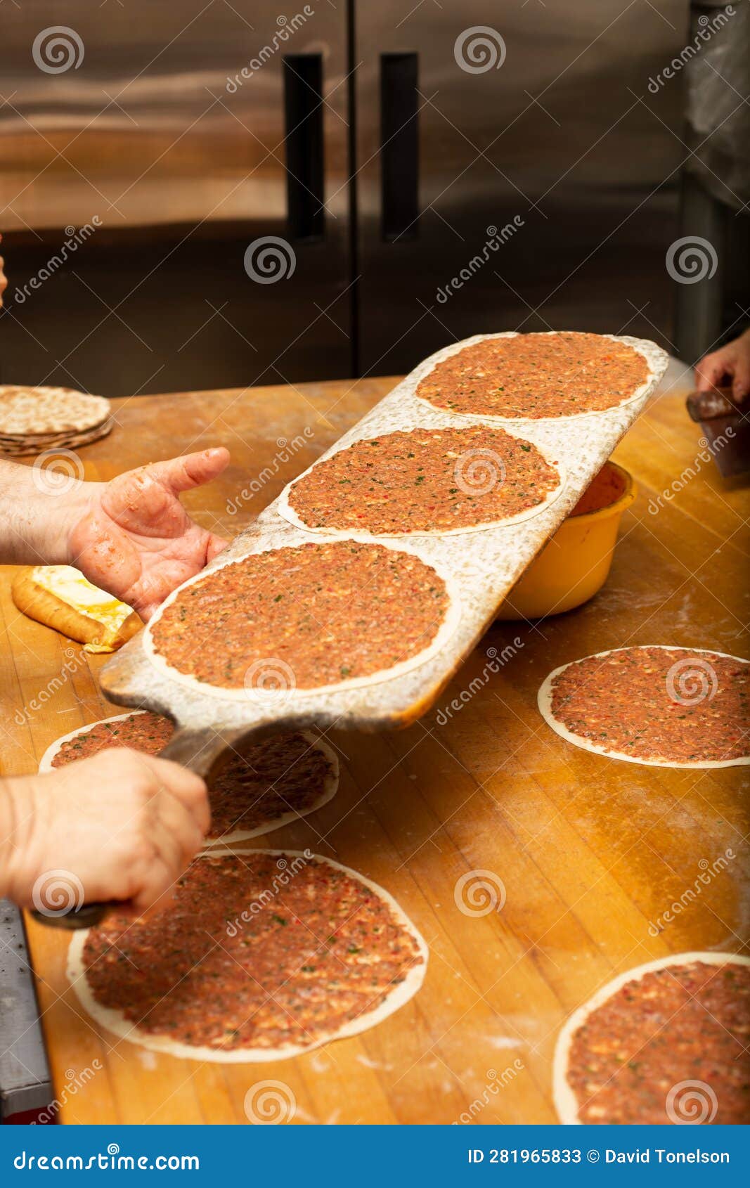 Manakish on wooden paddle stock image. Image of lifestyle - 281965833