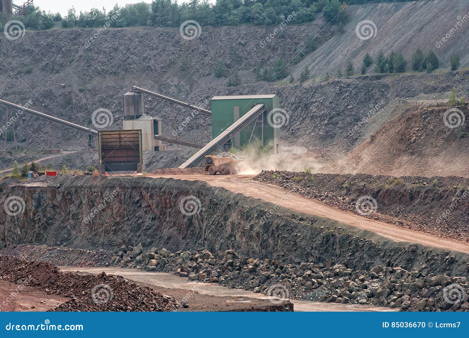 View into a Quarry Mine with Dumper Truck and Earthmover Stock Photo ...