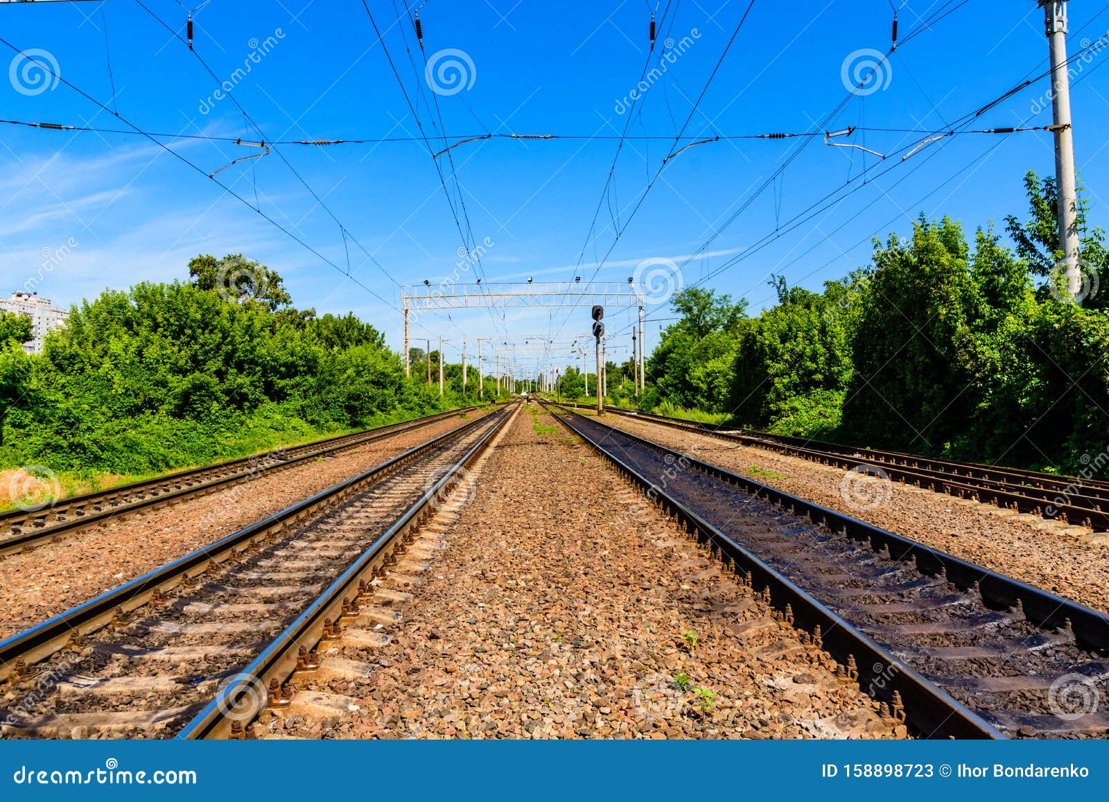 View on a Railroad Track and White Clouds in Blue Sky Stock Image ...