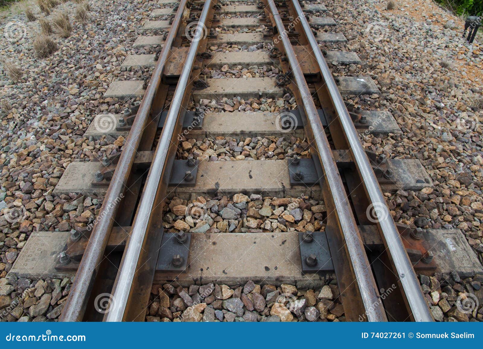 A Railroad Corssing With A Red Warning Sign And Warning Lamp And A ...