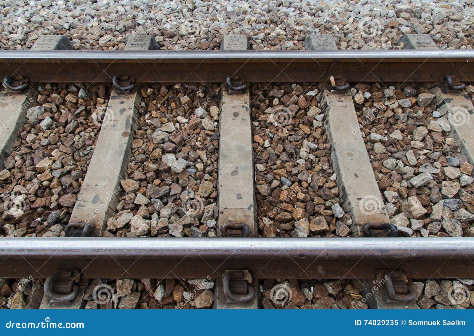 A Railroad Corssing With A Red Warning Sign And Warning Lamp And A ...