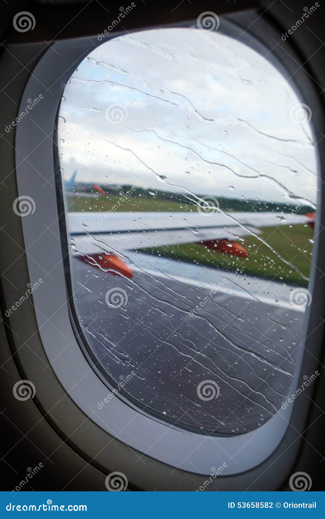 View of Rainy Airplane Window during Takeoff Stock Photo - Image of ...