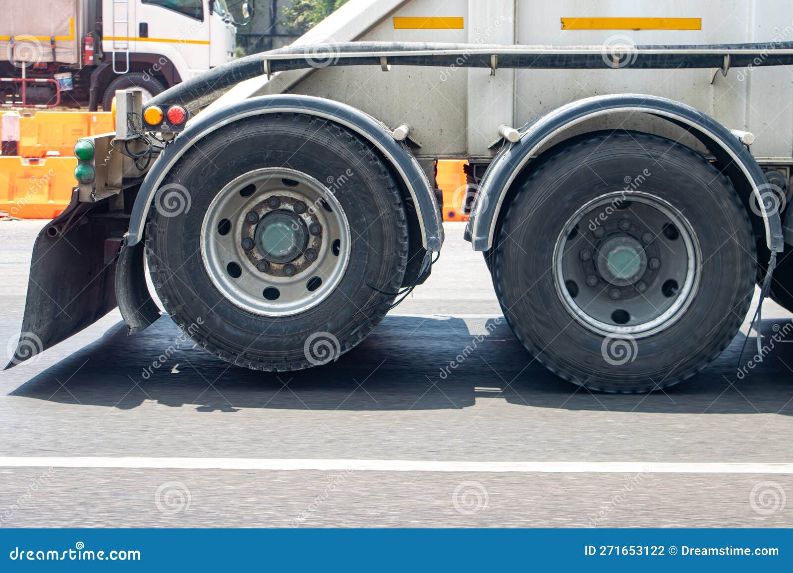 View of the Rear Wheels of a Truck while Driving with the Rear Axle ...
