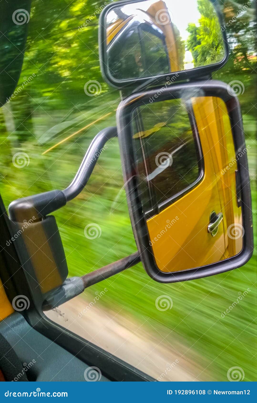 View through the Rearview Mirror at Speed while Driving in the Car on ...