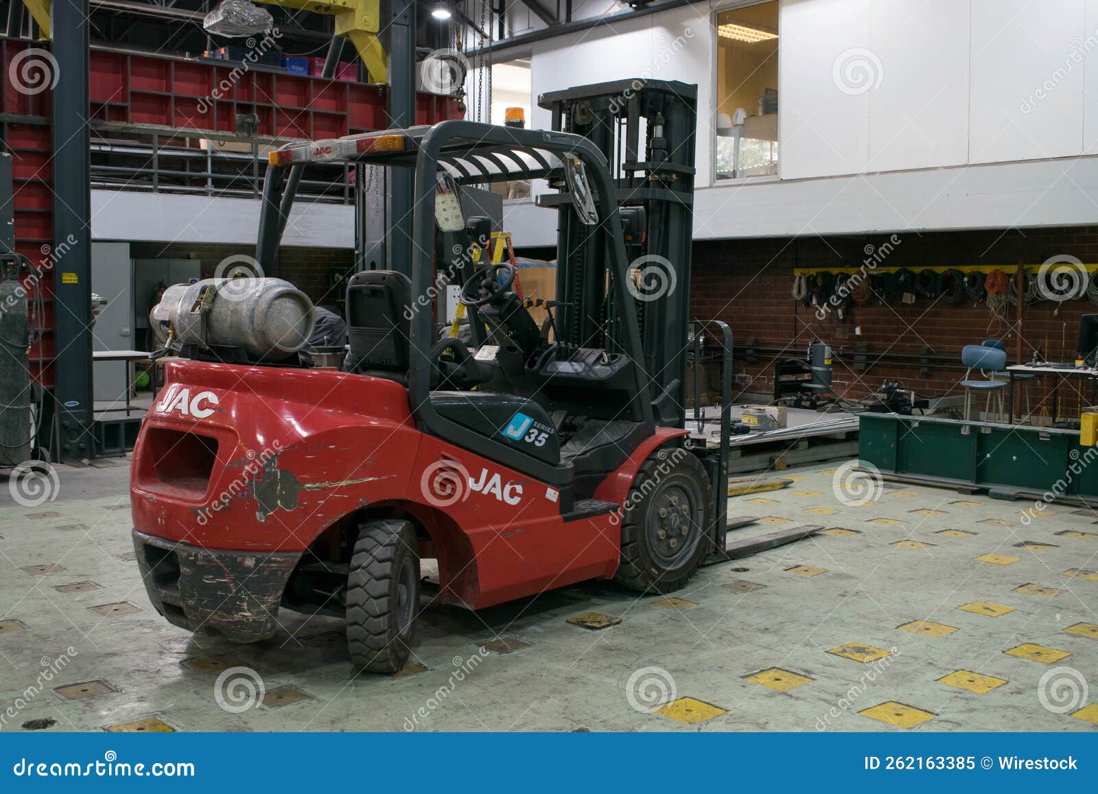 View of a red forklift editorial image. Image of factory - 262163385