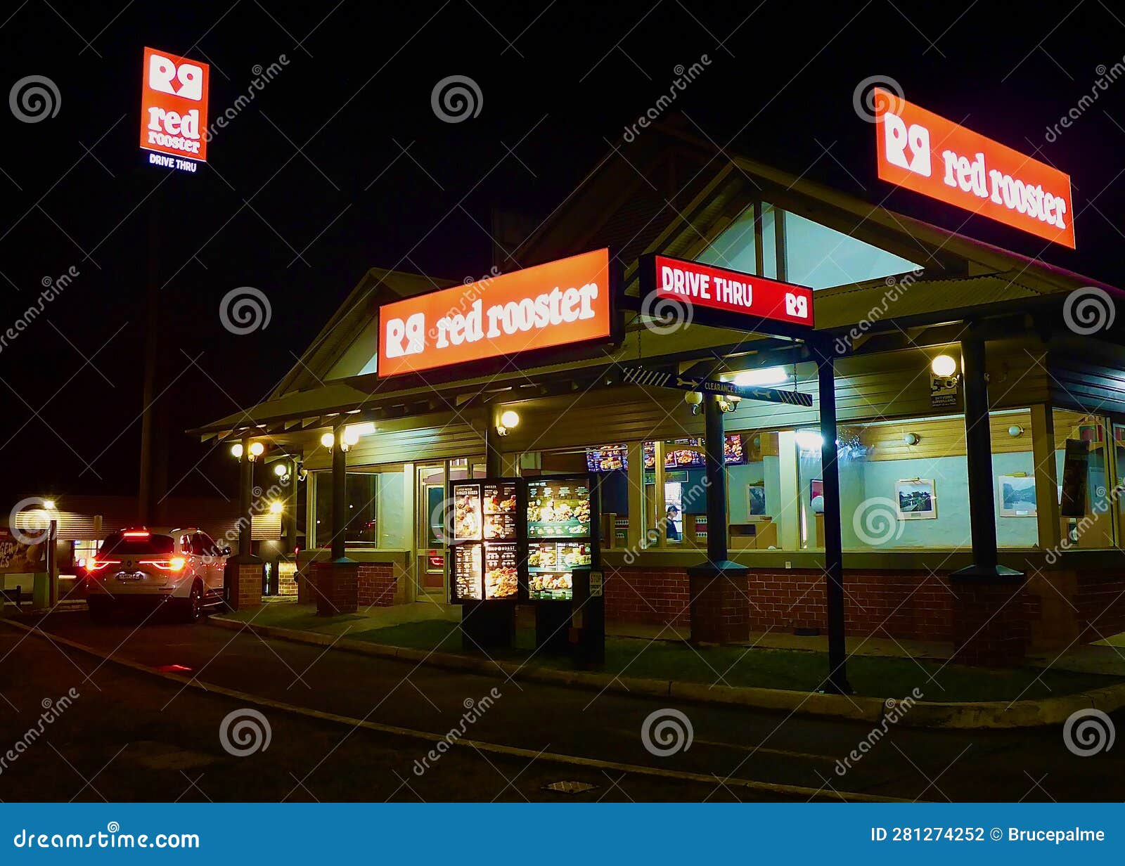 A View of a Red Rooster Restaurant at Night Editorial Photography ...