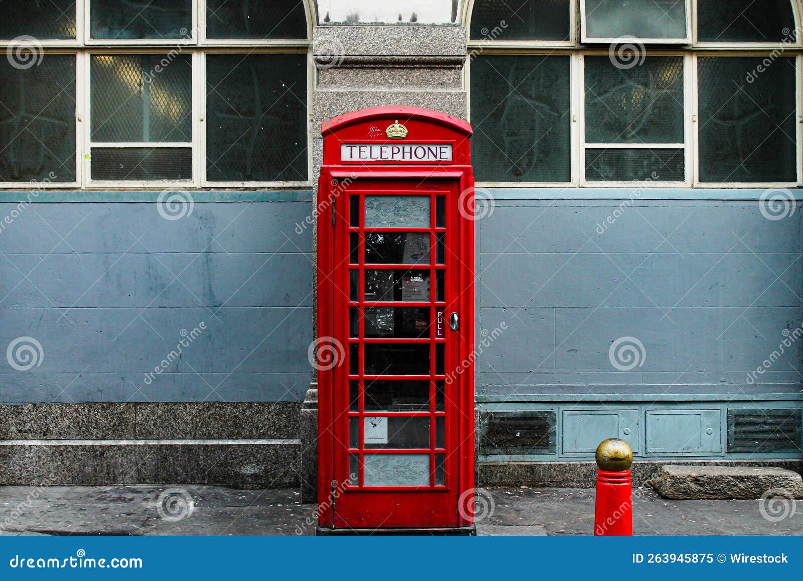 View of a Red Telephone Box in Front of a Building Stock Image - Image ...