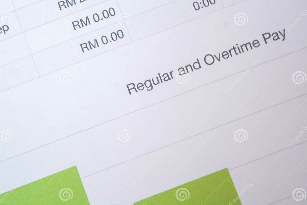 View of a Regular and Overtime Pay Sheet Paper, with a Concept of ...