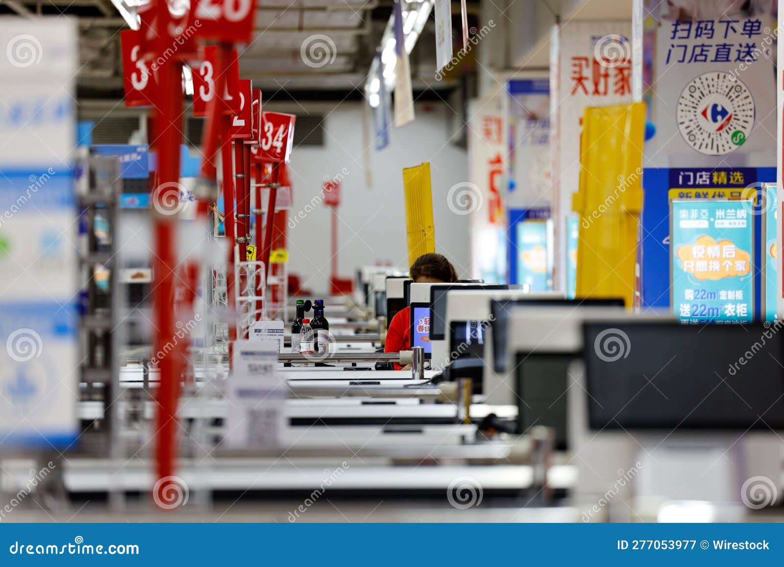 View of a Retail Store with Numerous Checkout Counters Arranged in Neat ...