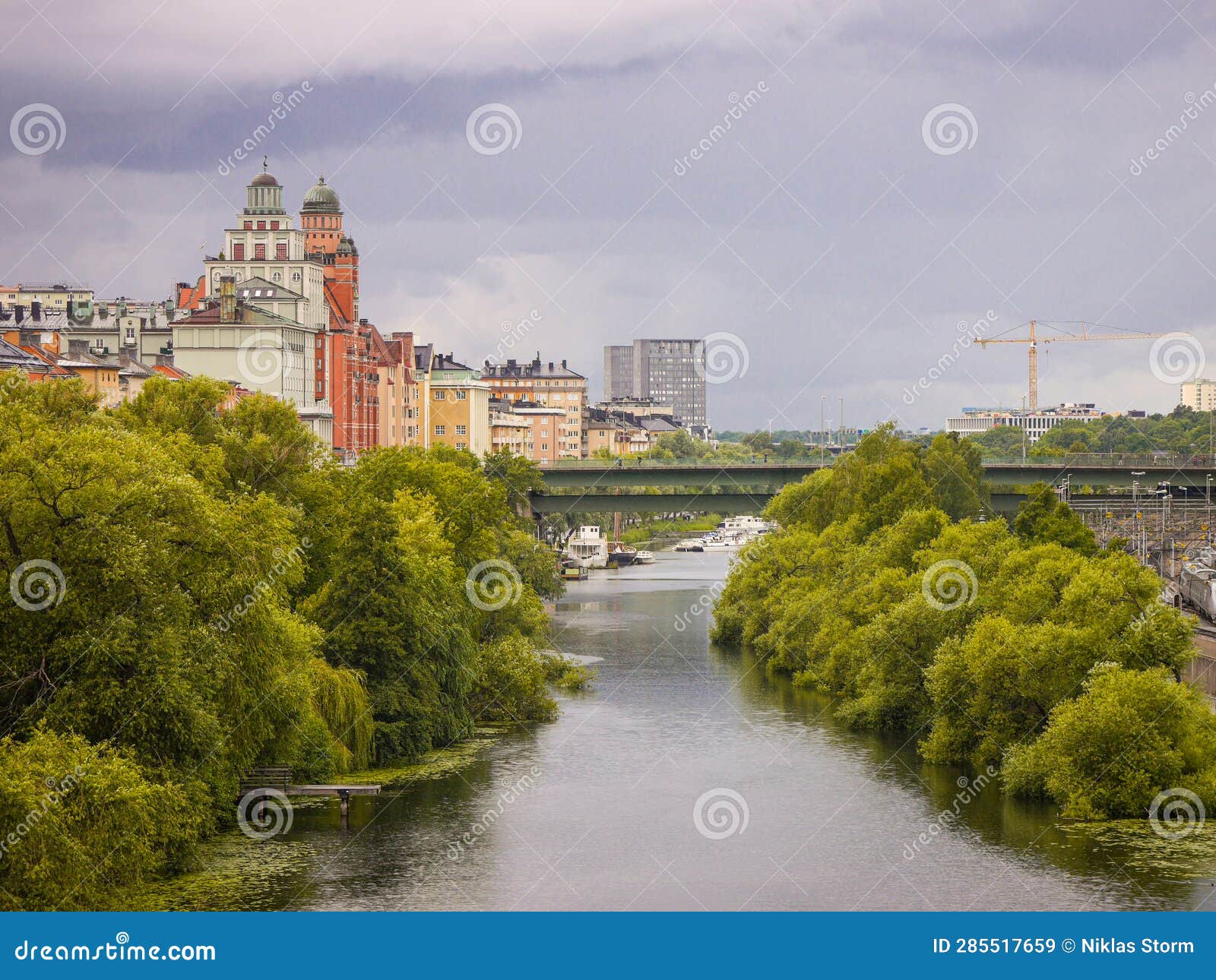 View of River Amidst Buildings in City Stock Image - Image of ...