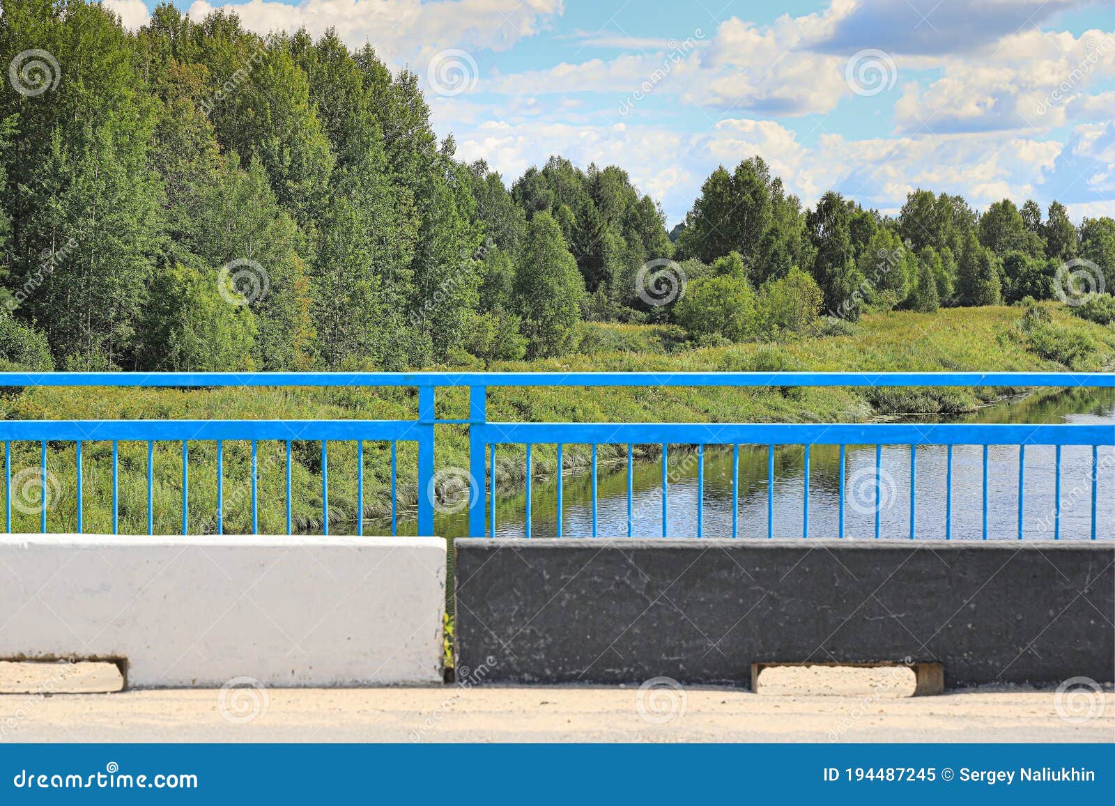 View of the River Bank through the Bridge Railing Stock Image - Image ...