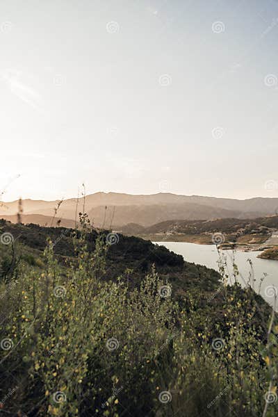 View of the River and the Mountain during the Beginning of the Sunset ...