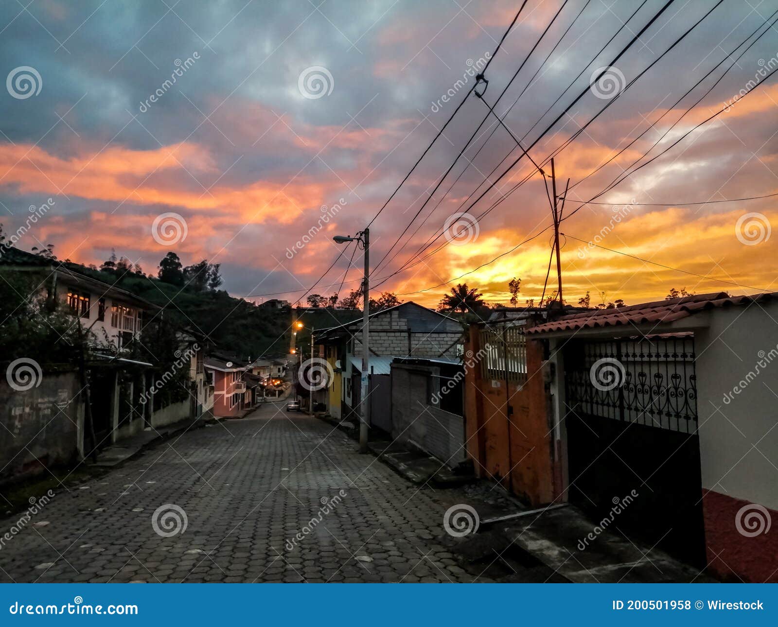View of Road with Electric Posts with a Sunset Background Stock Photo ...