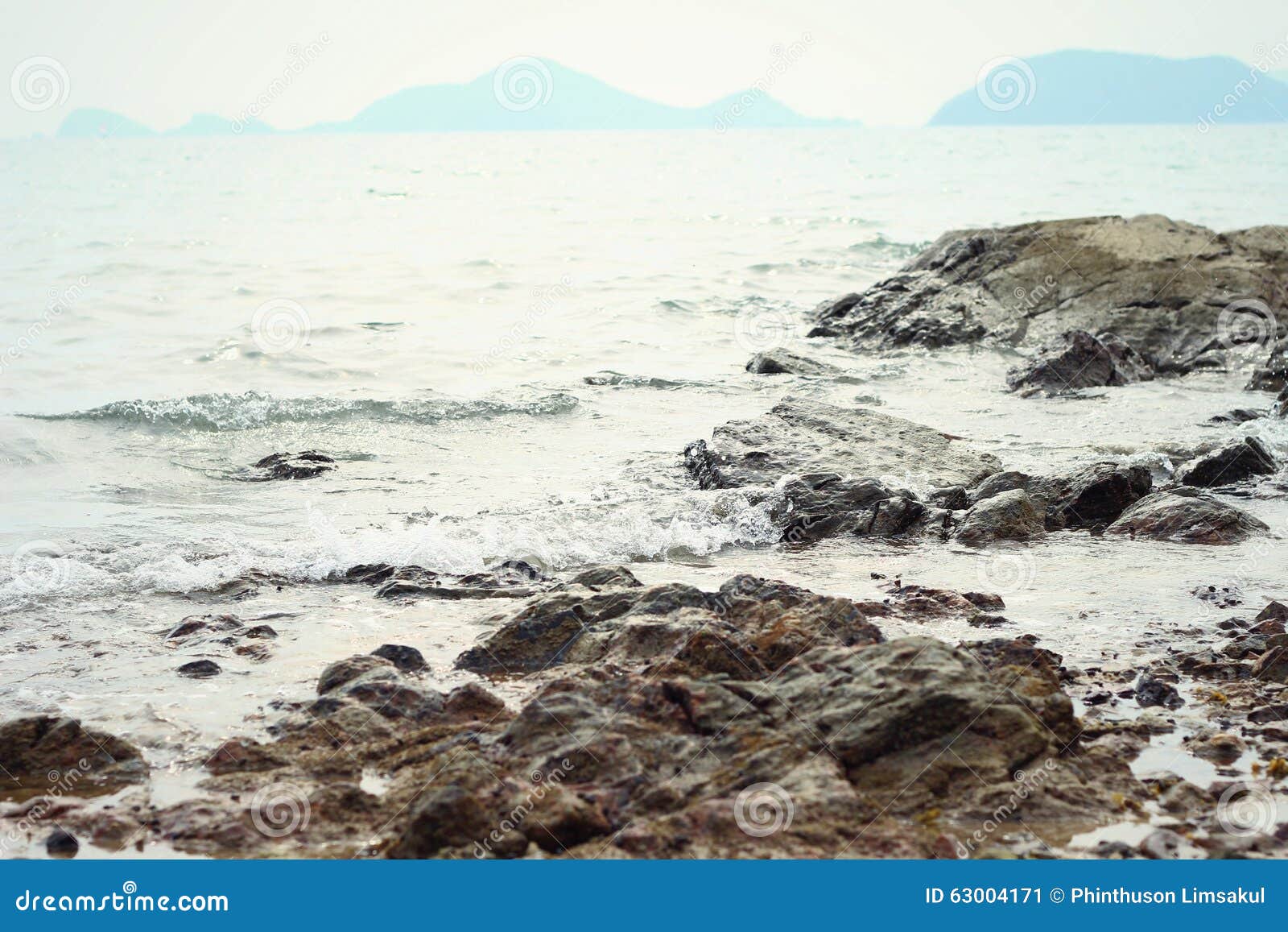 View of rock on the beach stock image. Image of beautiful - 63004171